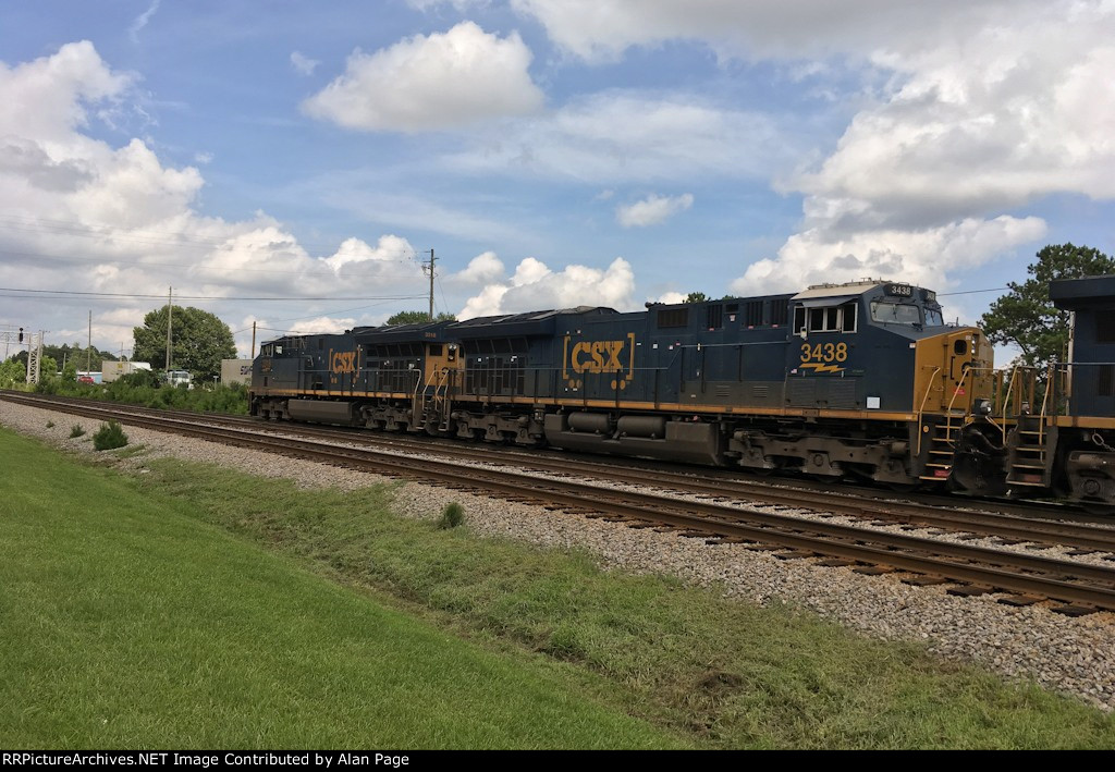 CSX 3318, 3438, and 7920 push a stack train